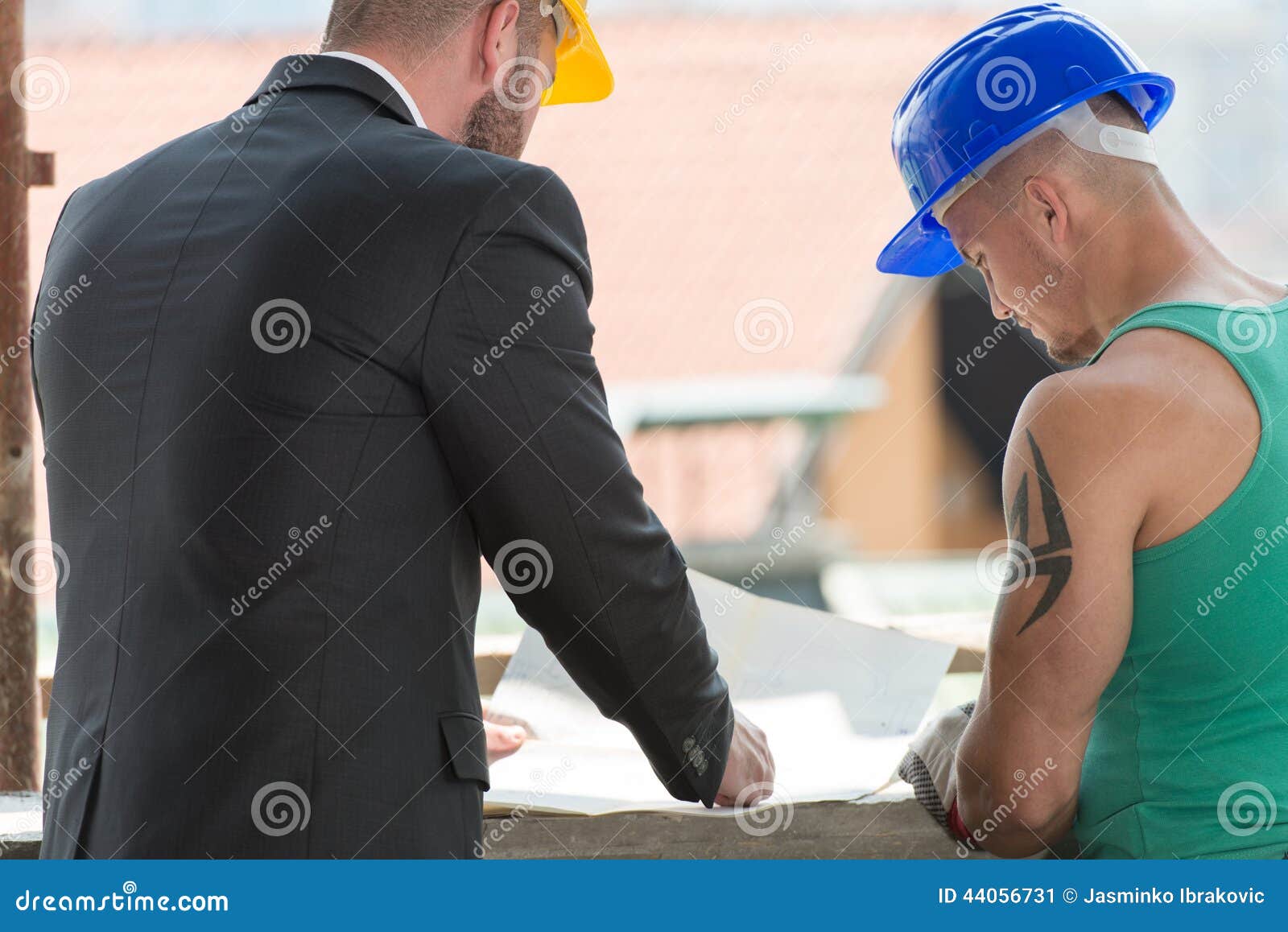 Engineer and Construction Worker Discussing a Project Stock Image ...