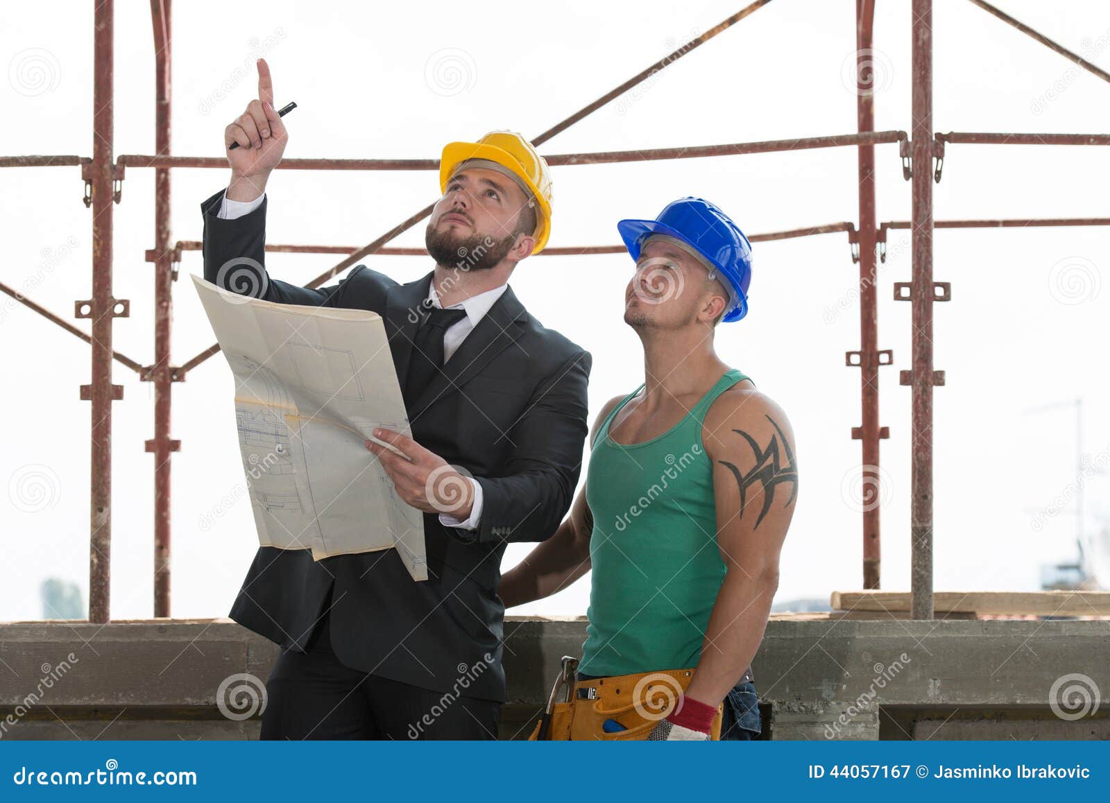 Engineer and Construction Worker Discussing a Project Stock Image ...