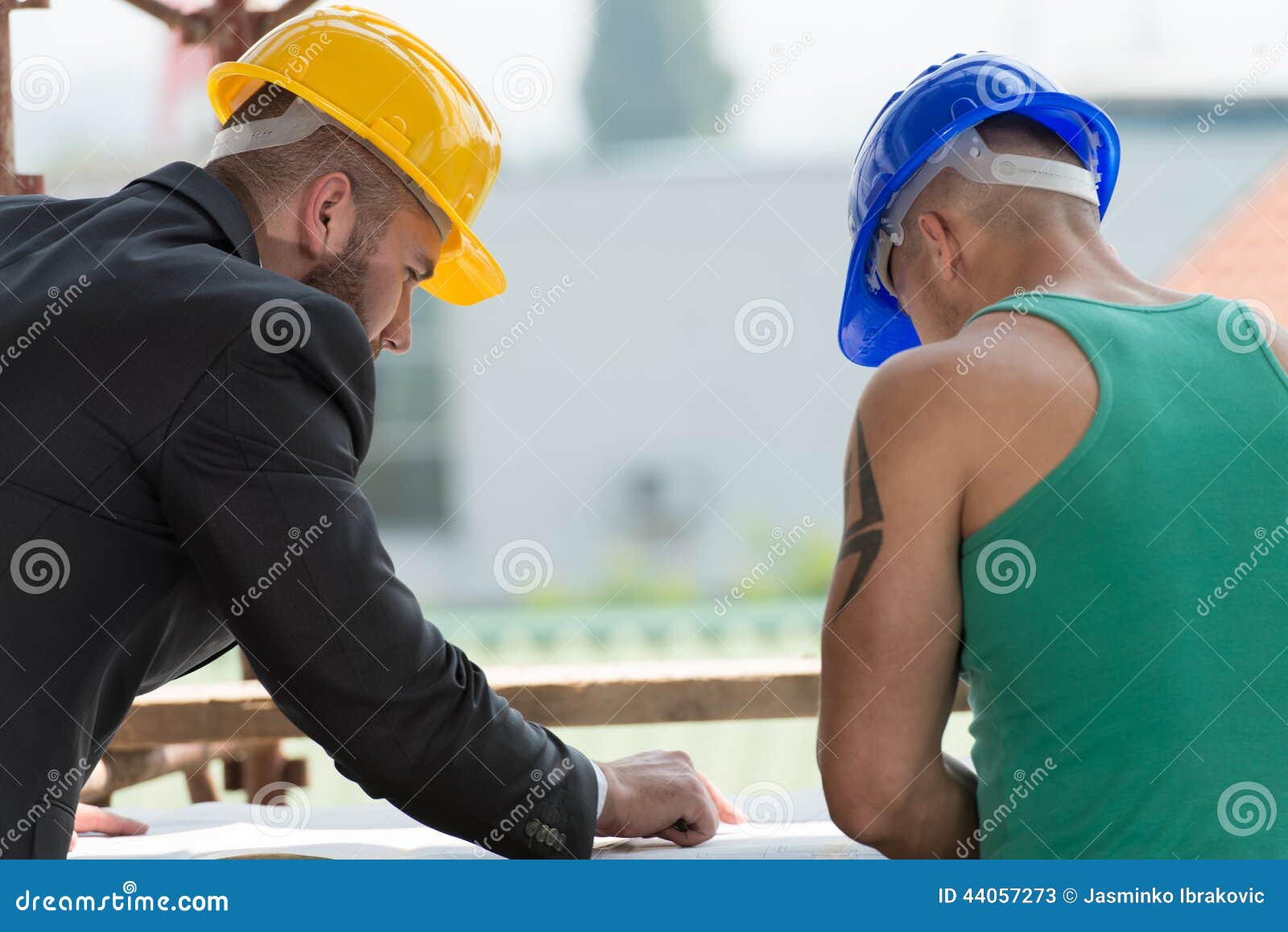 Engineer and Construction Worker Discussing a Project Stock Image ...