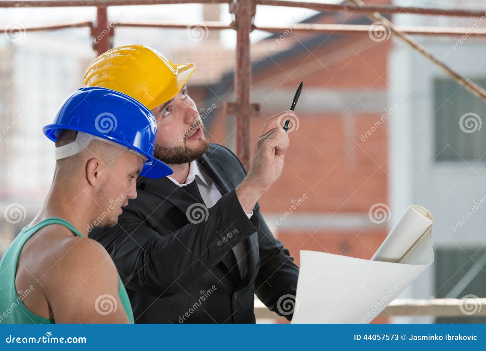 Engineer and Construction Worker Discussing a Project Stock Image ...