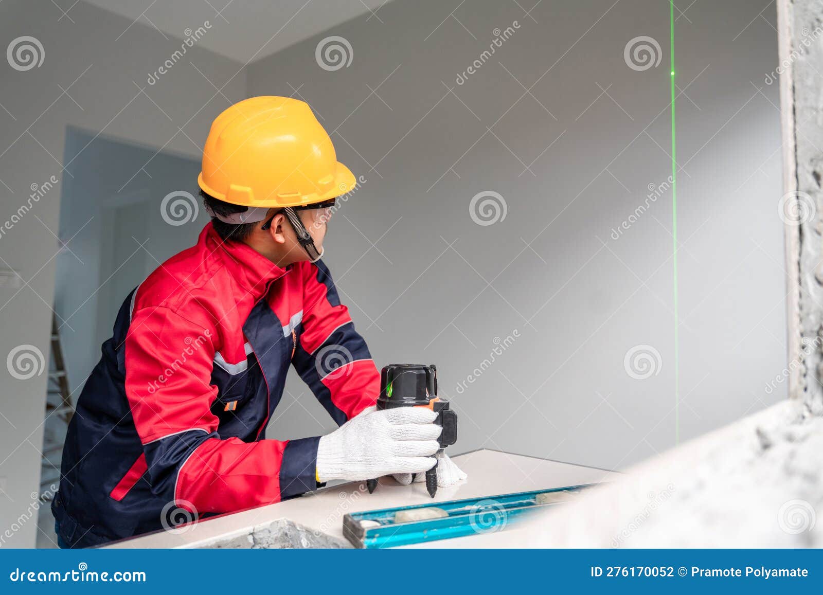 An Engineer or Construction Worker Laser Building Level with Green ...