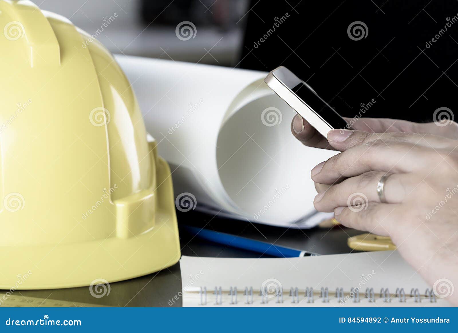 Engineer Construction Worker is Using Phone in Office Cable. Stock ...