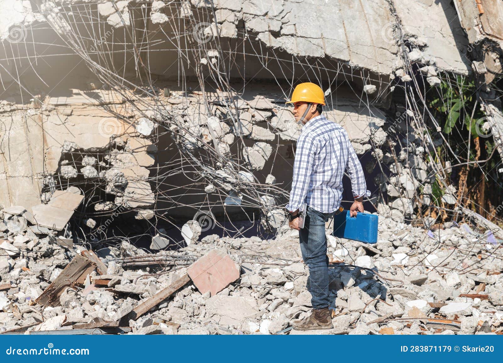 Engineer or Contractor Holding Tool Box in Destruction Demolishing ...