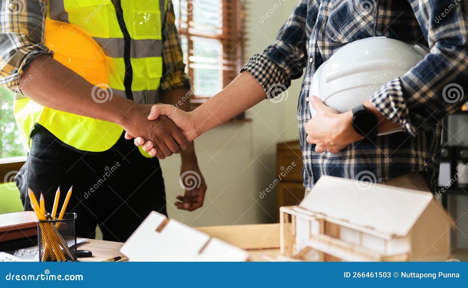 Engineer and Contractor Join Hands after Signing Contract,they are ...