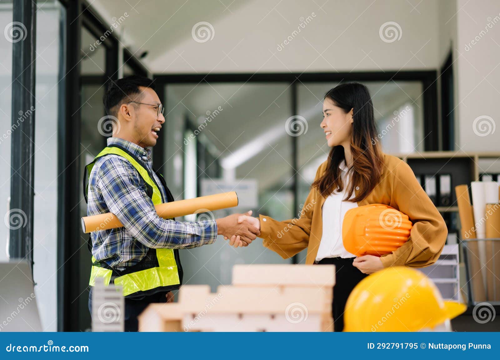 Engineer and Contractor Join Hands after Signing Contract,they are ...