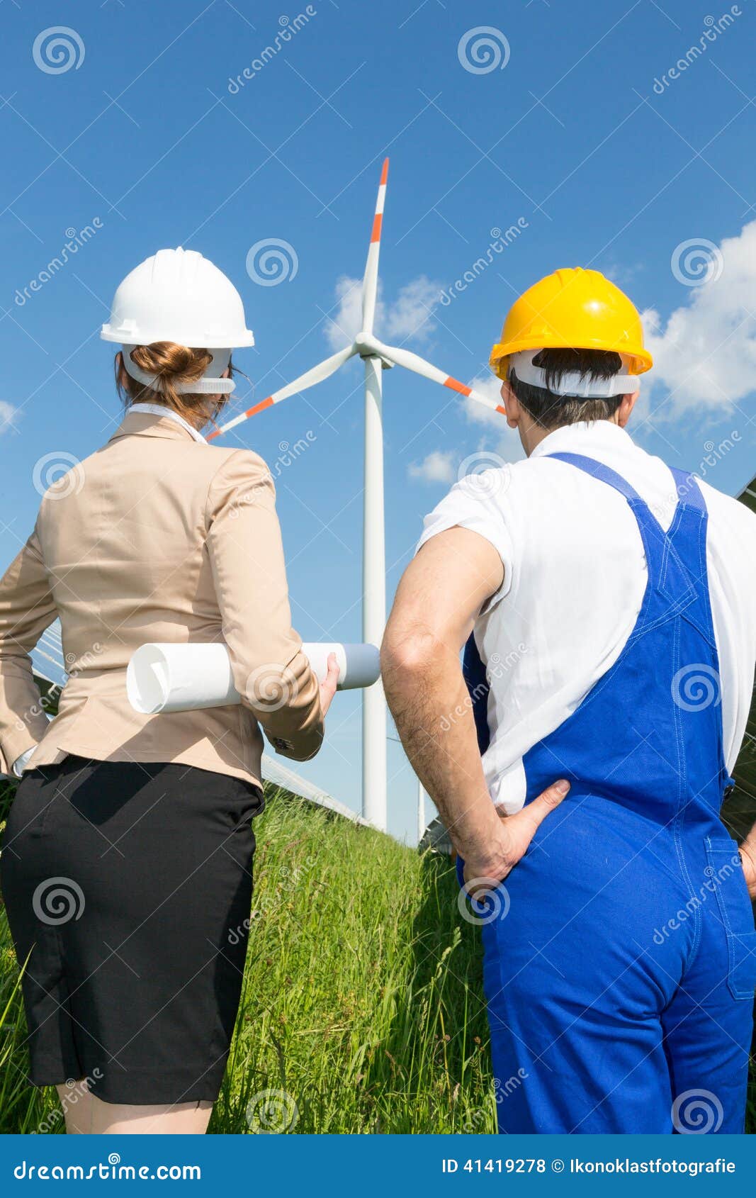 Engineer and Contractor Posing in Front of Wind Turbine Stock Photo ...