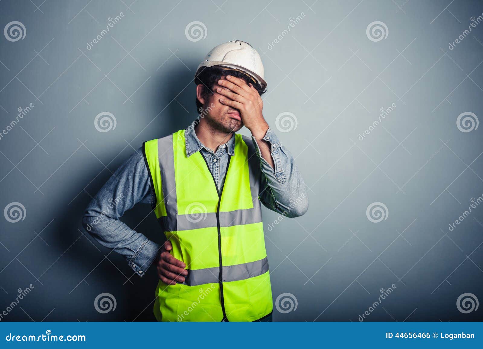 Engineer covering his face stock photo. Image of hardhat - 44656466