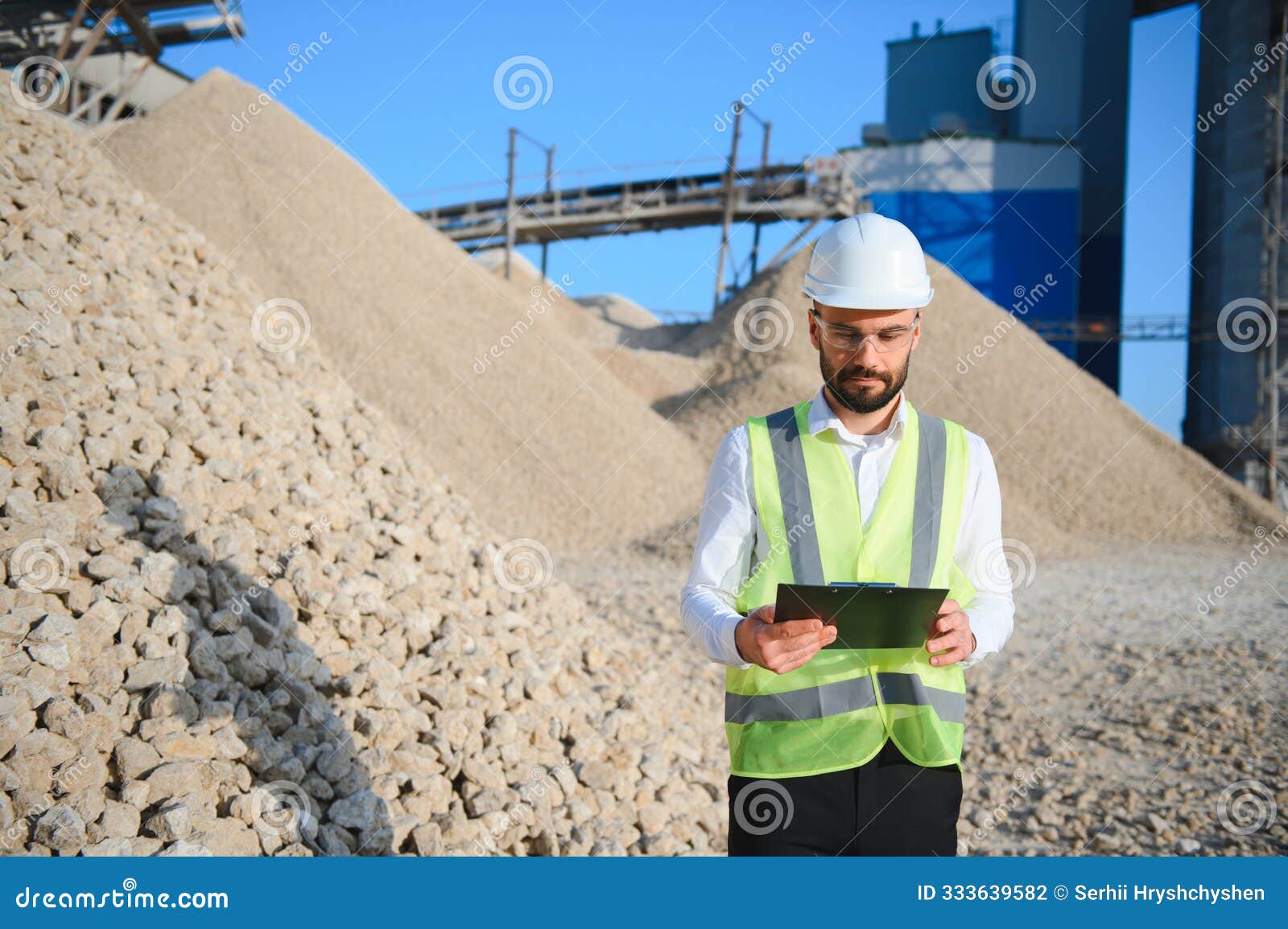 An Engineer at a Crushed Stone or Gravel Plant. Stone Mining Stock ...