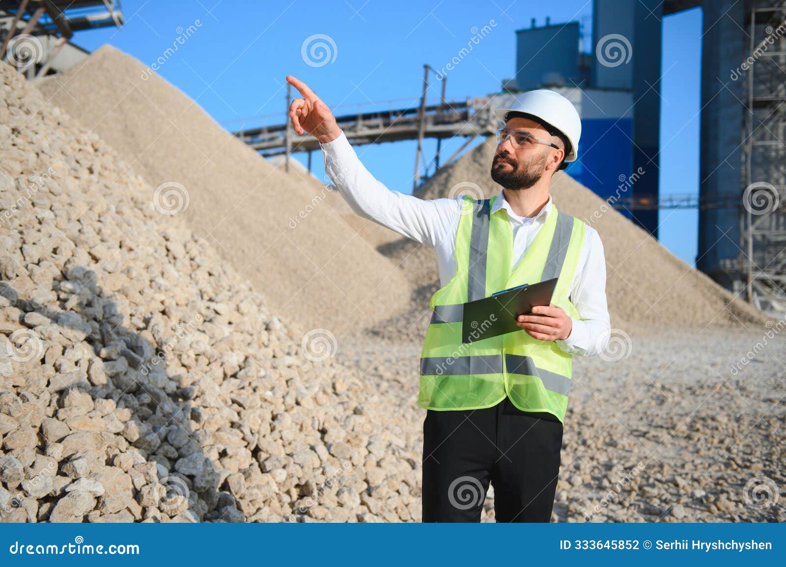 An Engineer at a Crushed Stone or Gravel Plant. Stone Mining Stock ...