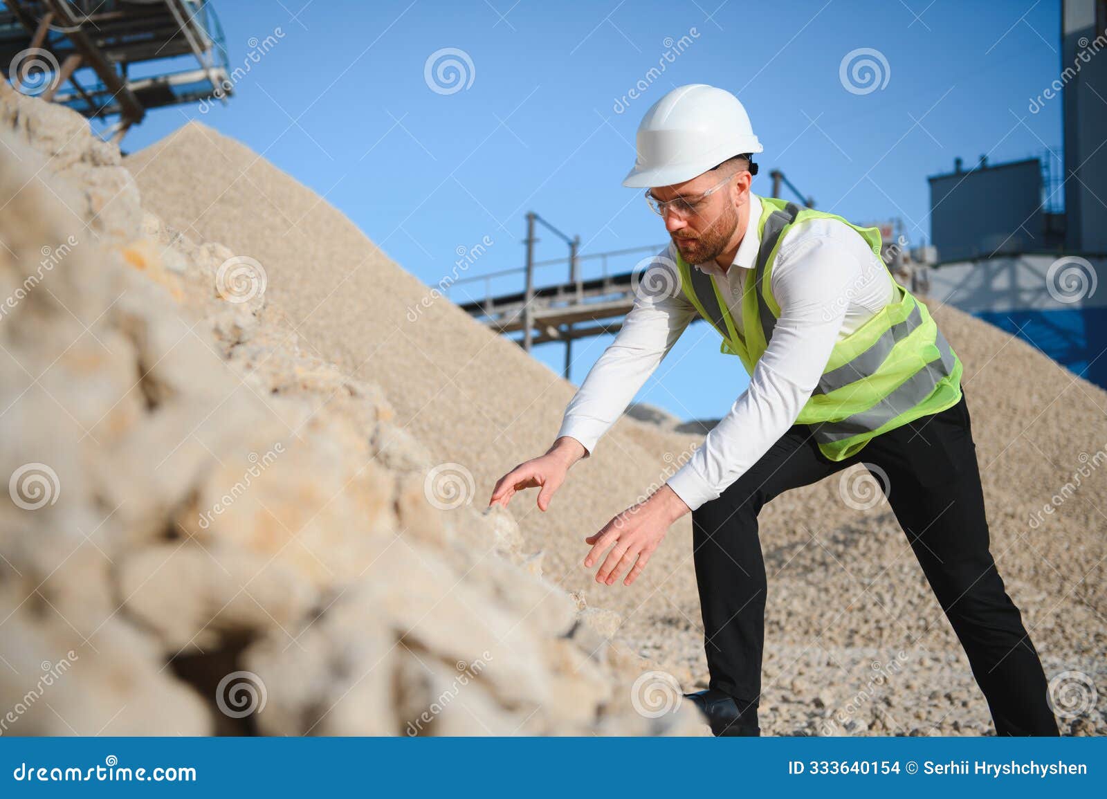 Engineer at the Crushed Stone Production Plant. Gravel Stock Photo ...