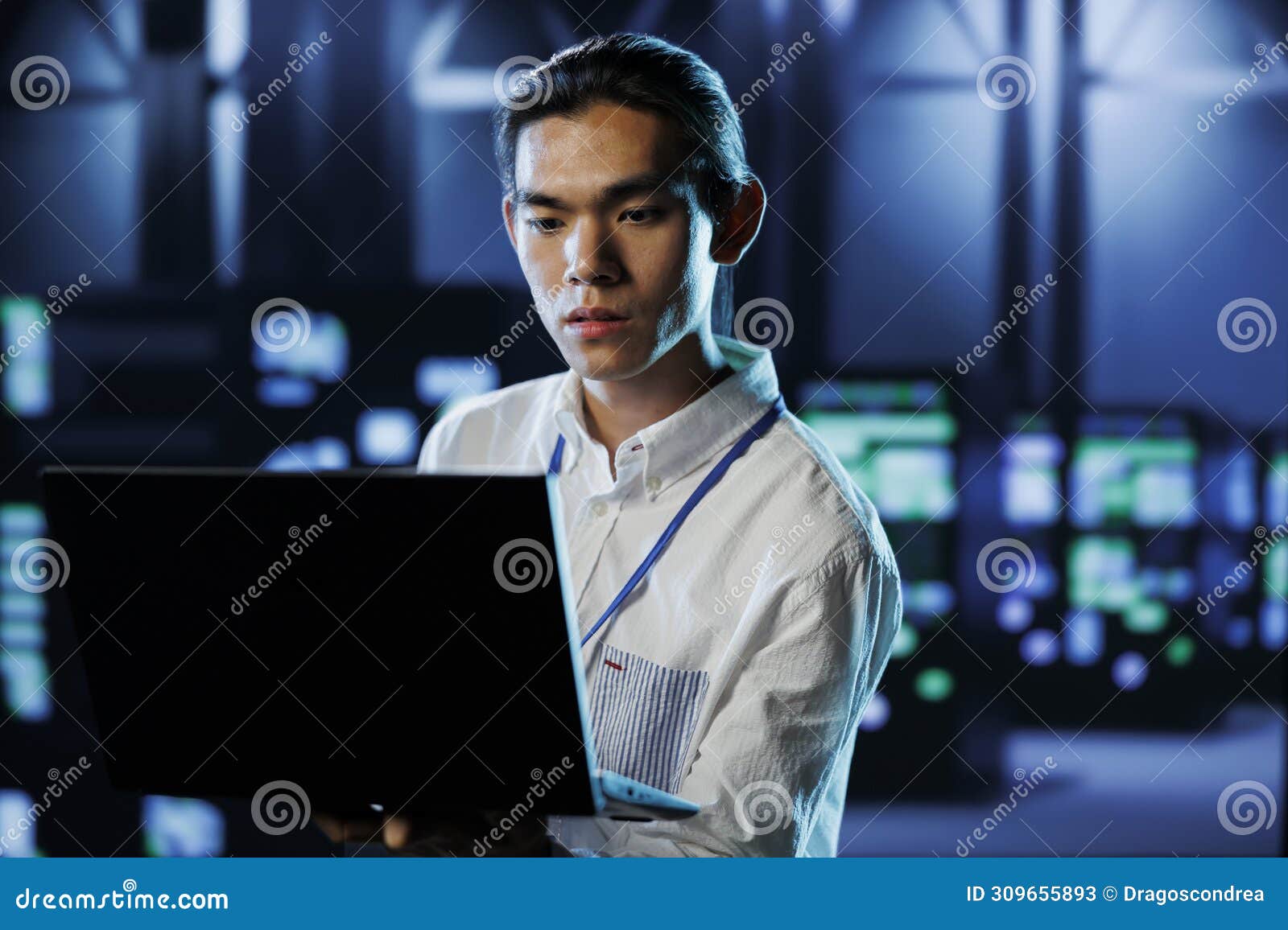 Engineer in Data Center with Laptop Stock Image - Image of technician ...