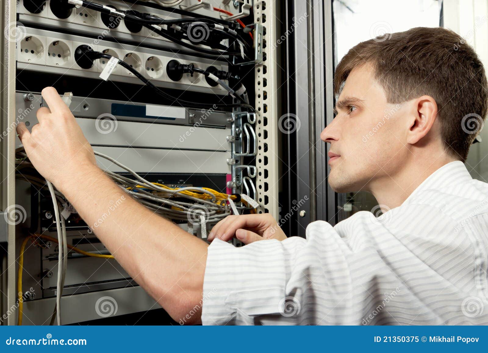 The engineer in datacenter stock image. Image of laptop - 21350375