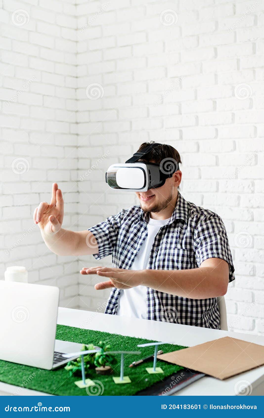 Engineer or Designer Using VR Glasses Visualising Reneable Energy ...