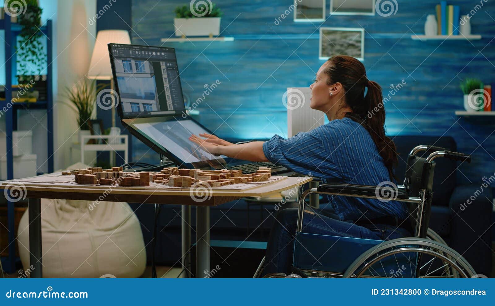 Engineer with Disability Using Touch Screen for Building Model Stock ...