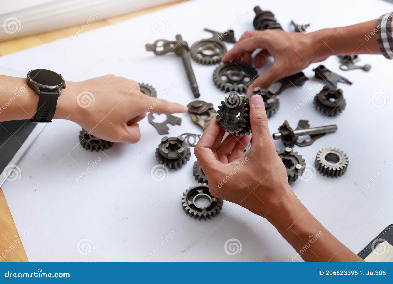 Engineer Discussing and Designing about Mechanical Gear Parts in Office ...