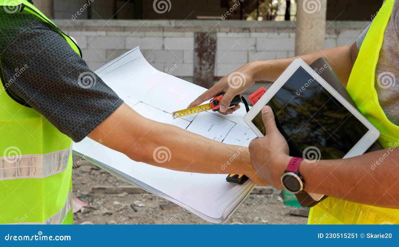 Engineer Discussing with Foreman about Project in Building Construction ...