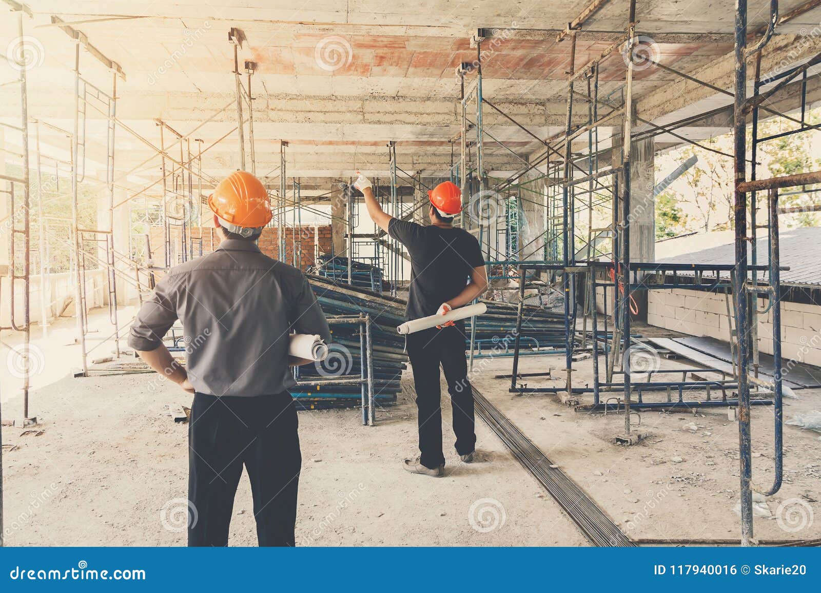 Engineer Discussing with Foreman about Project in Const Stock Photo ...