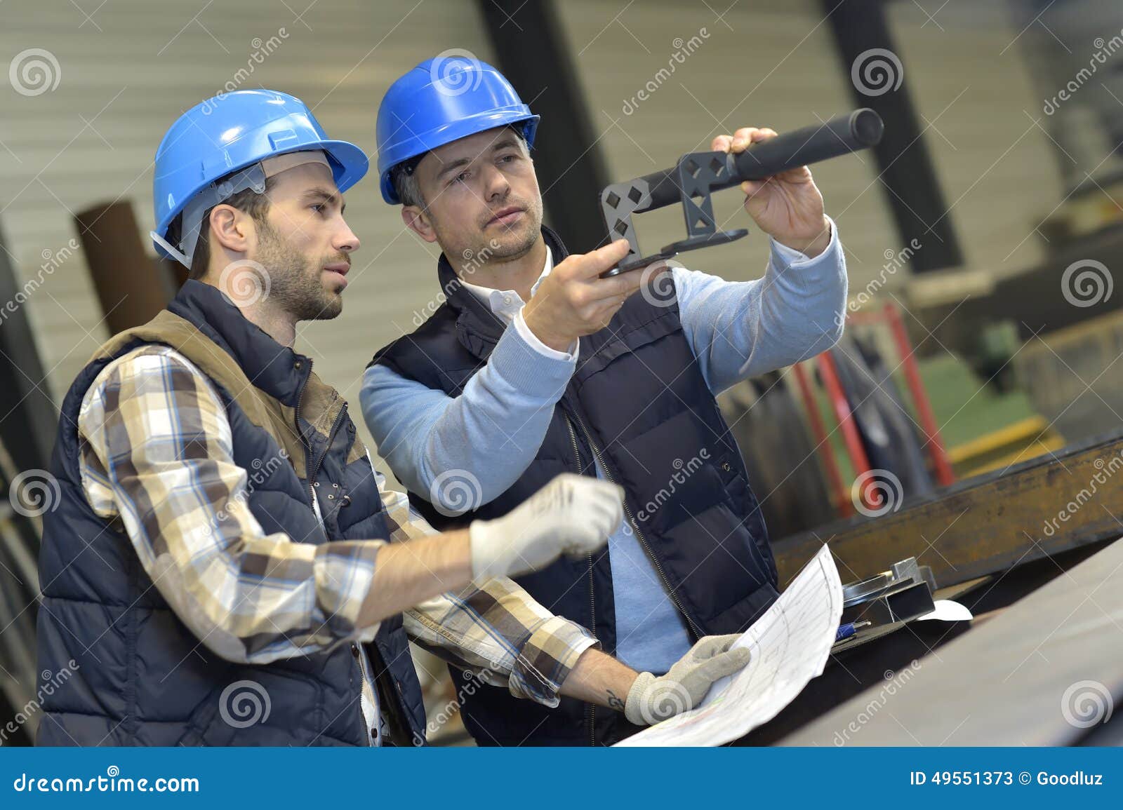 Engineer Discussing with Mechanical Worker on Products Stock Image ...