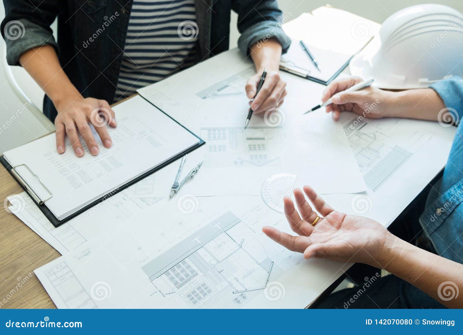 Engineer Discussing Meeting Working on Blueprint Project Architectural ...