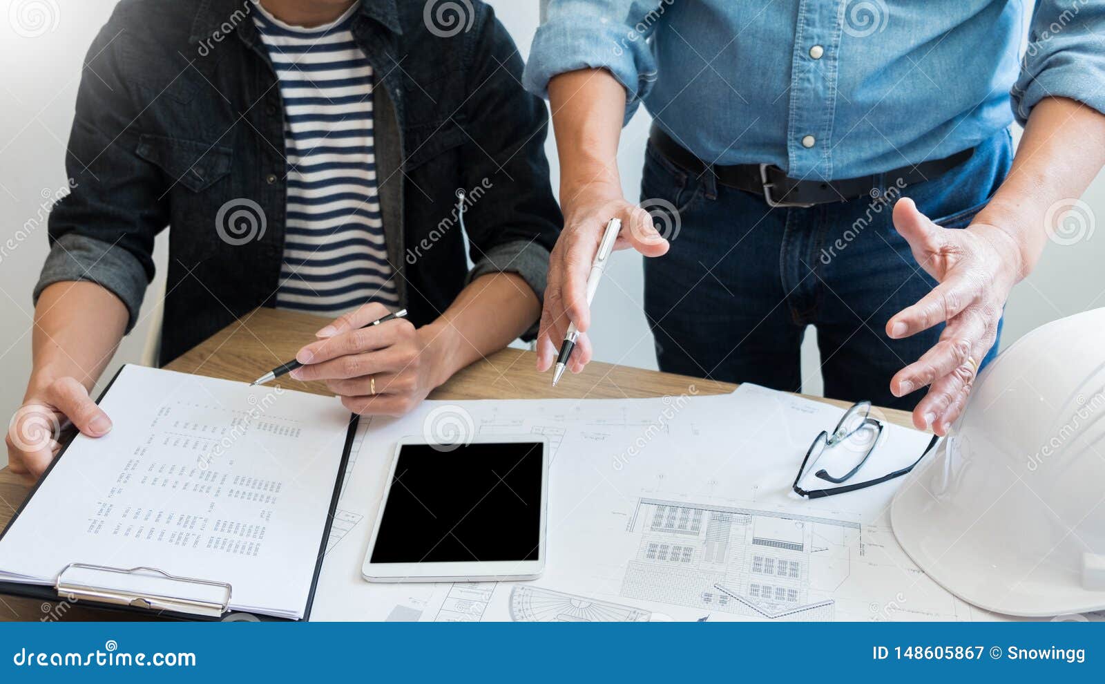 Engineer Discussing Meeting Working on Blueprint Project Architectural ...