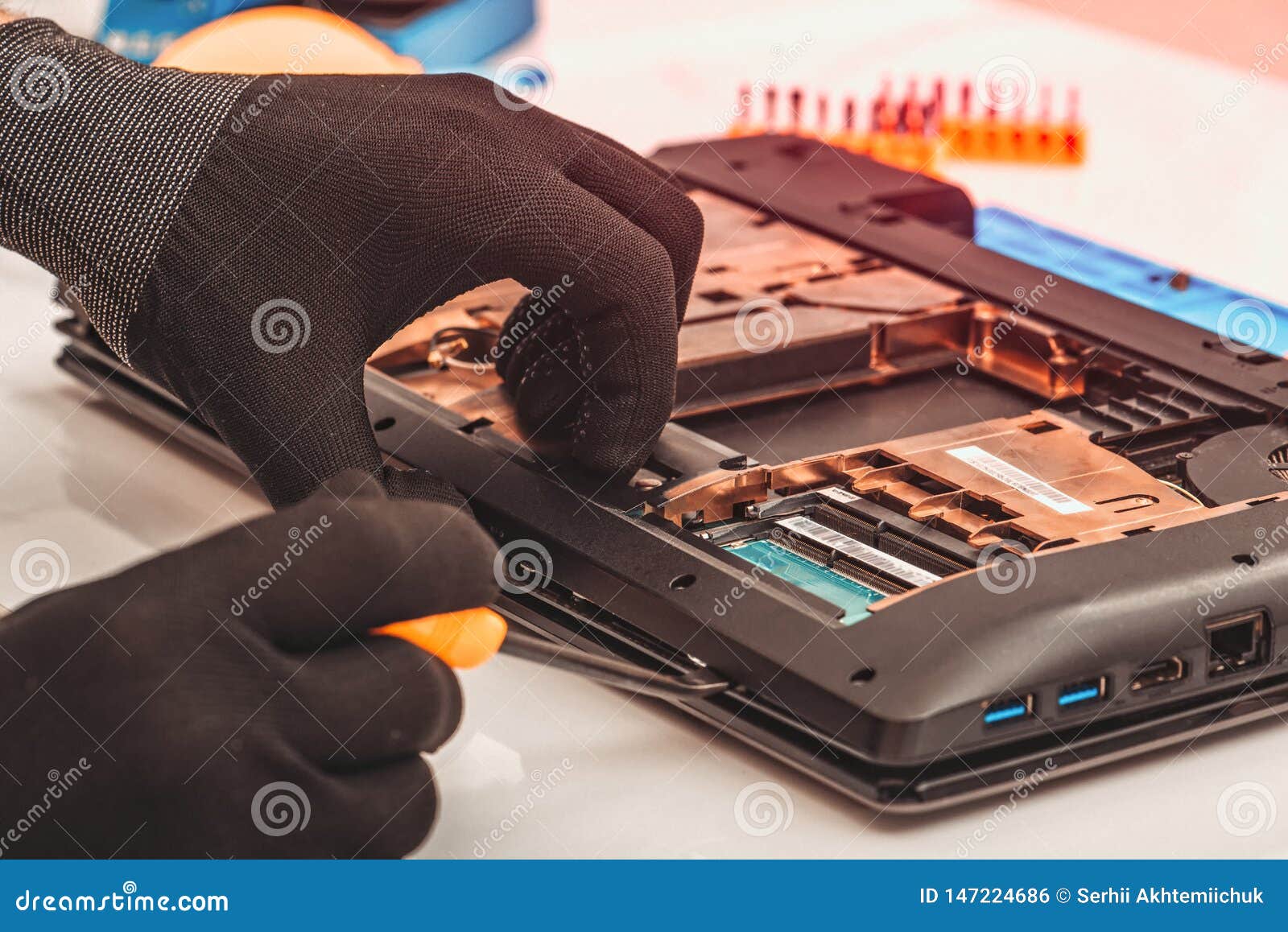 Engineer Dismantles The Details Of A Broken Laptop For Repair Royalty ...