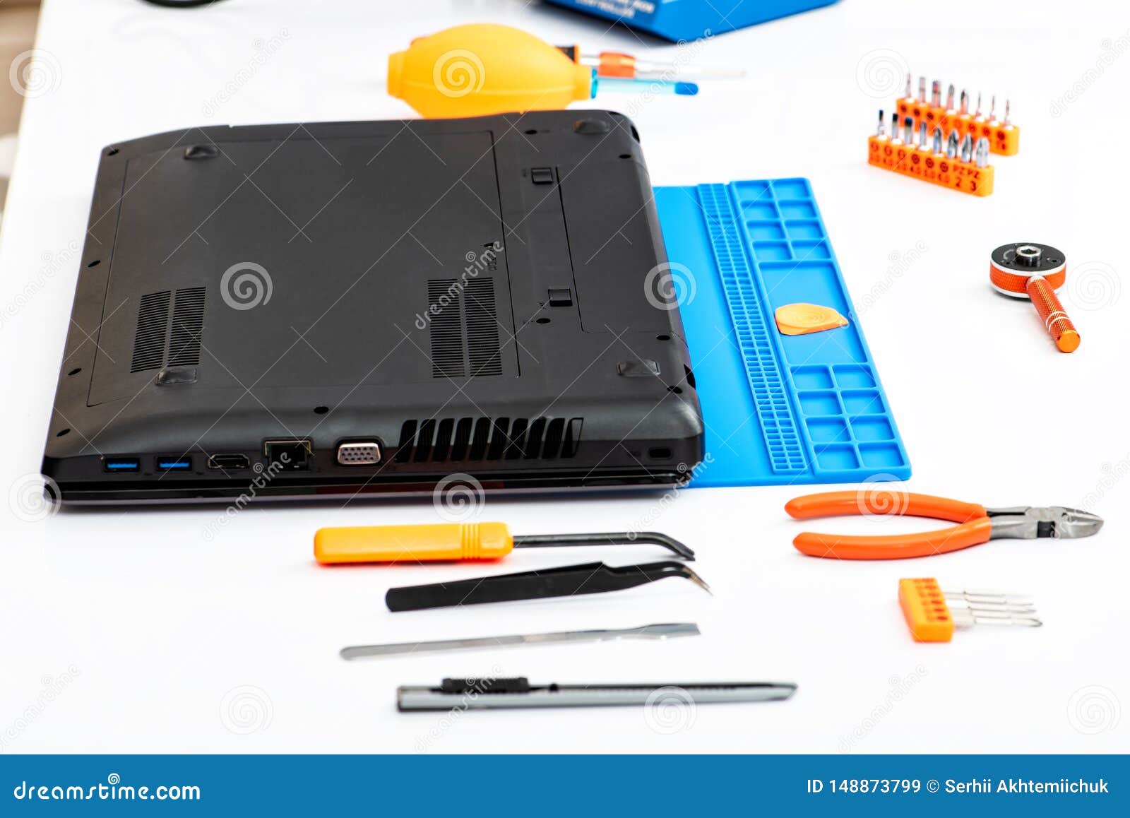 Engineer Dismantles the Details of a Broken Laptop for Repair Stock ...