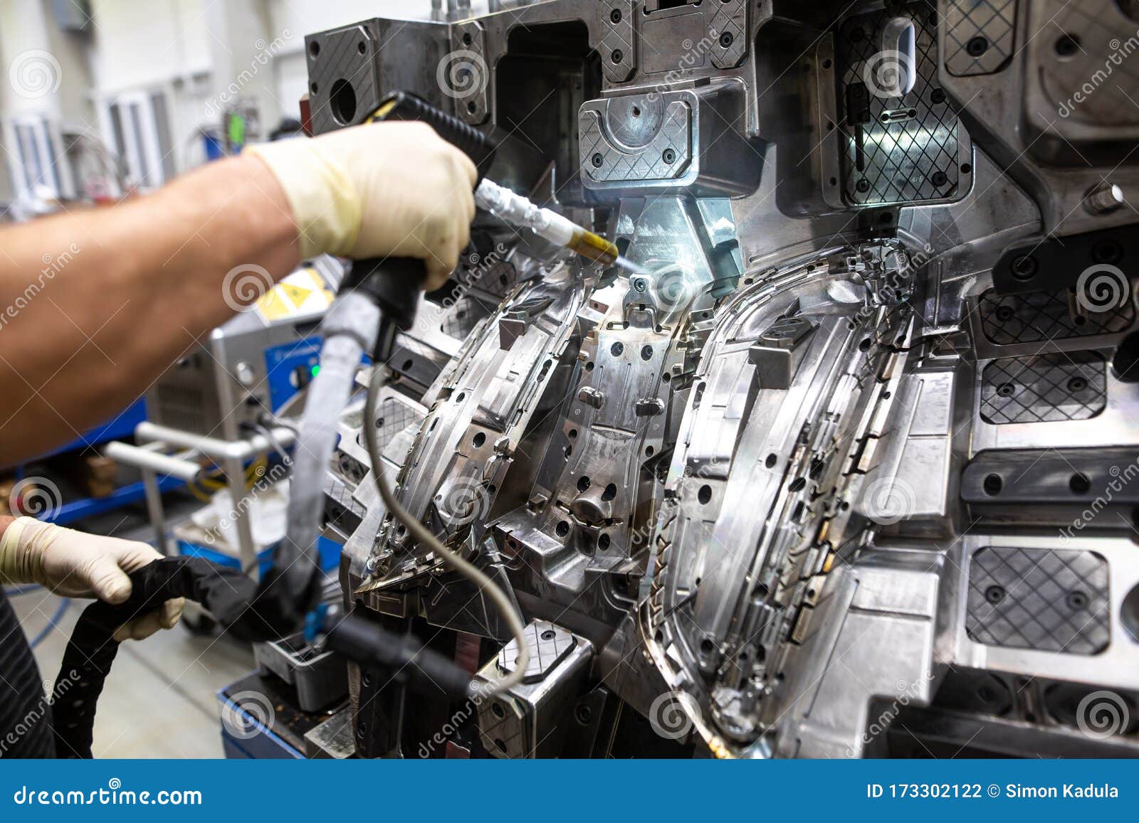 Engineer Doing Maintenance on the Injection Mold after Production by ...
