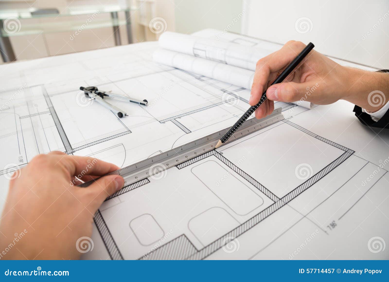 Engineer Drawing Diagrams On Blueprint Paper Stock Image ...