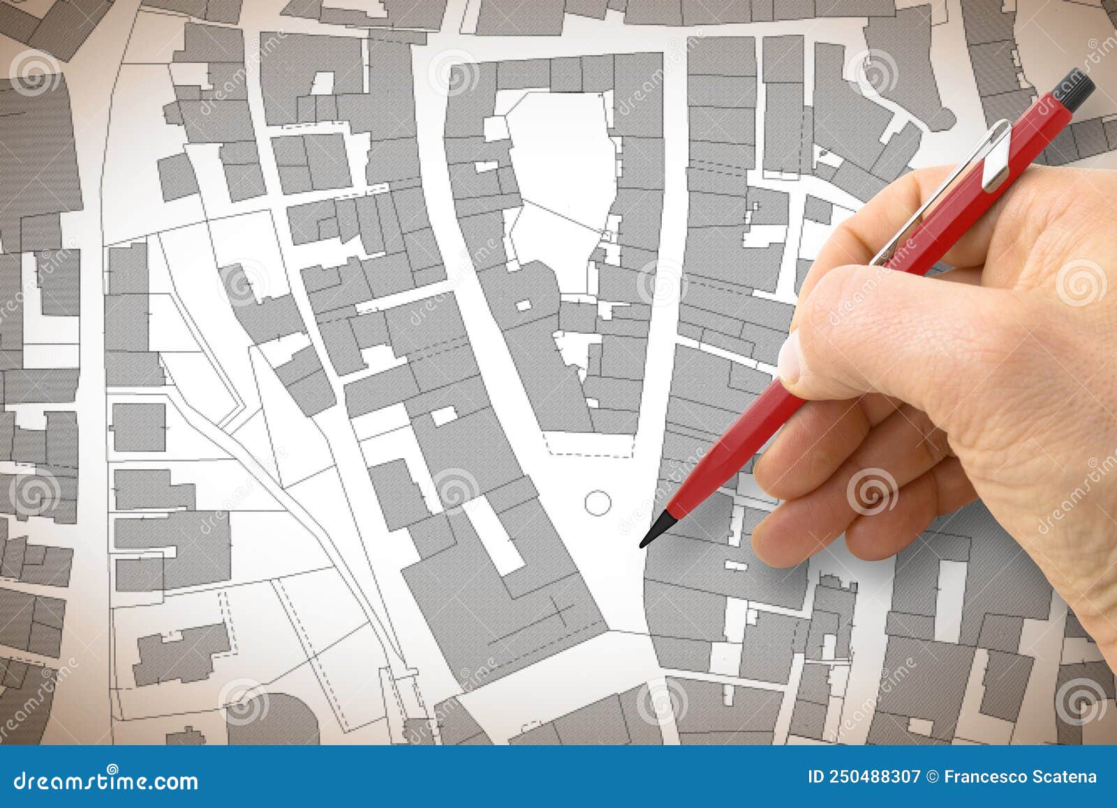 Engineer Drawing an Imaginary City Map of Territory with Buildings ...