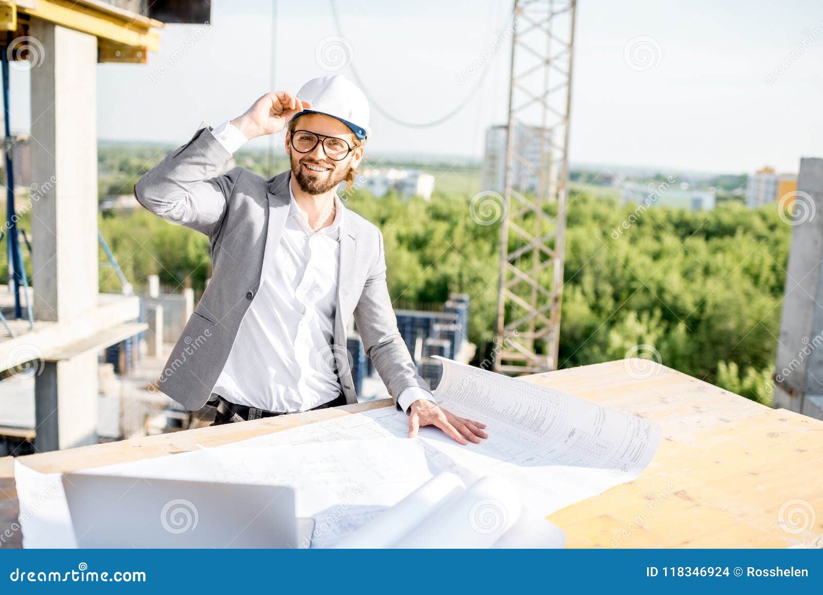 Engineer with Drawings on the Structure Stock Photo - Image of crane ...