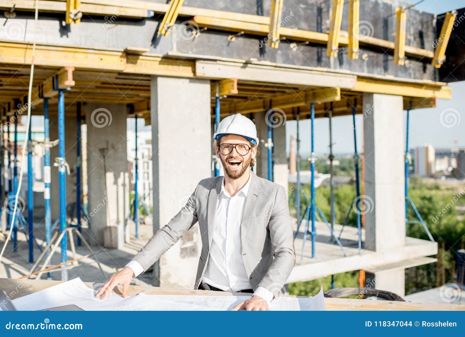 Engineer with Drawings on the Structure Stock Photo - Image of business ...