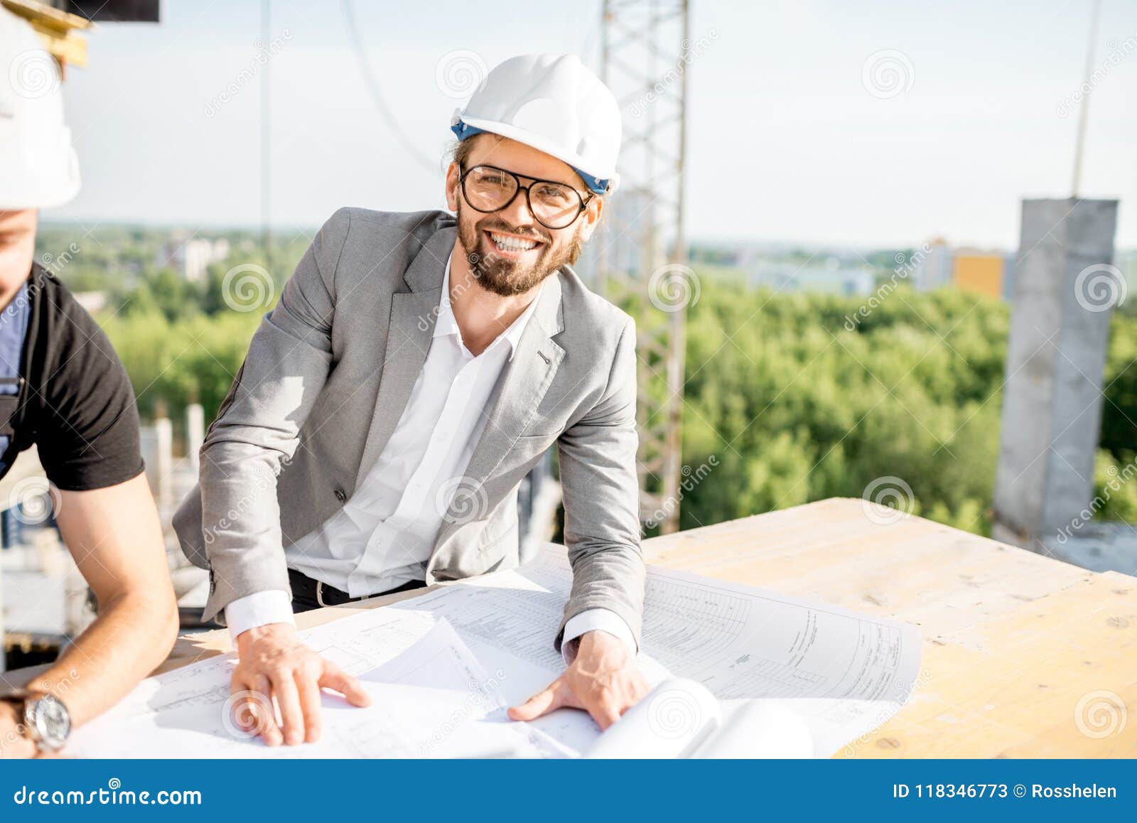 Engineer with Drawings on the Structure Stock Image - Image of outdoors ...