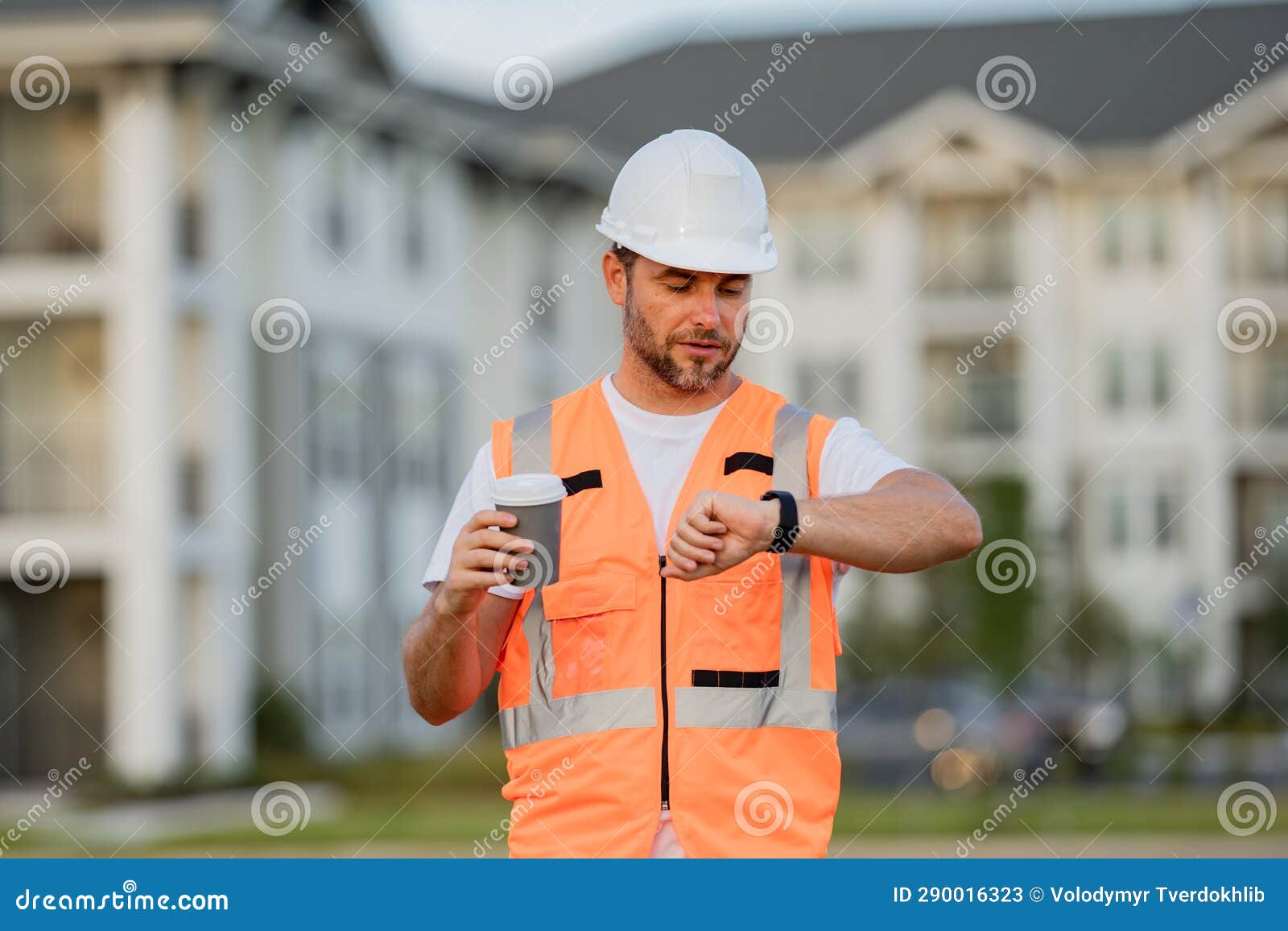 Engineer Drinking Take Away Coffee on Break. Builder on Site ...