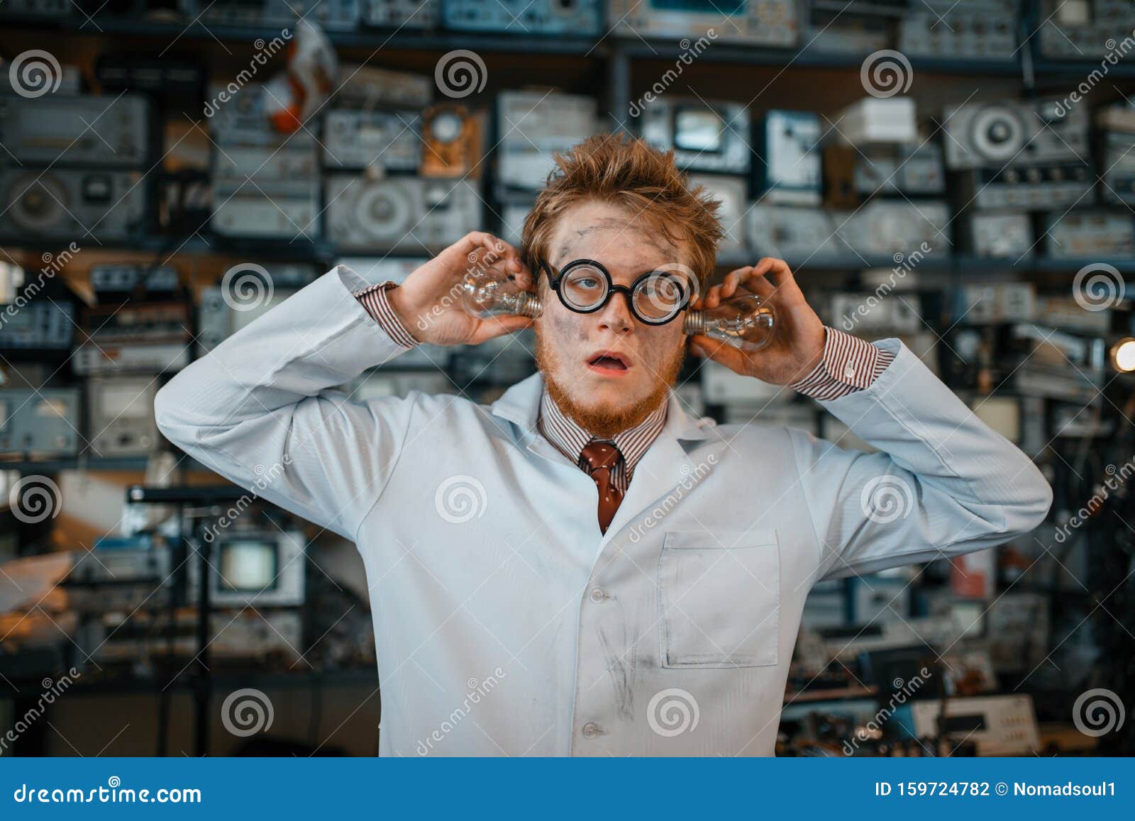 Engineer with Electric Lamps in Ears, Test in Lab Stock Photo - Image ...