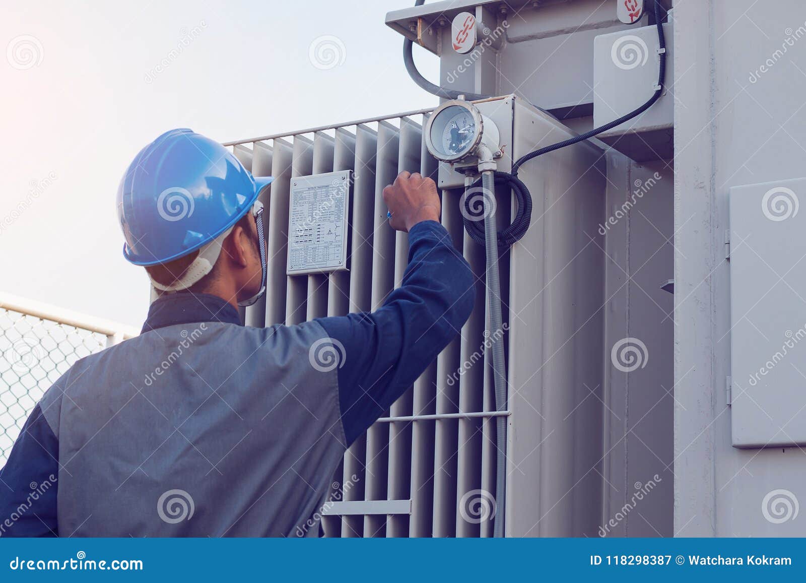 Engineer or Electrician Working on Checking and Maintenance Equipment ...