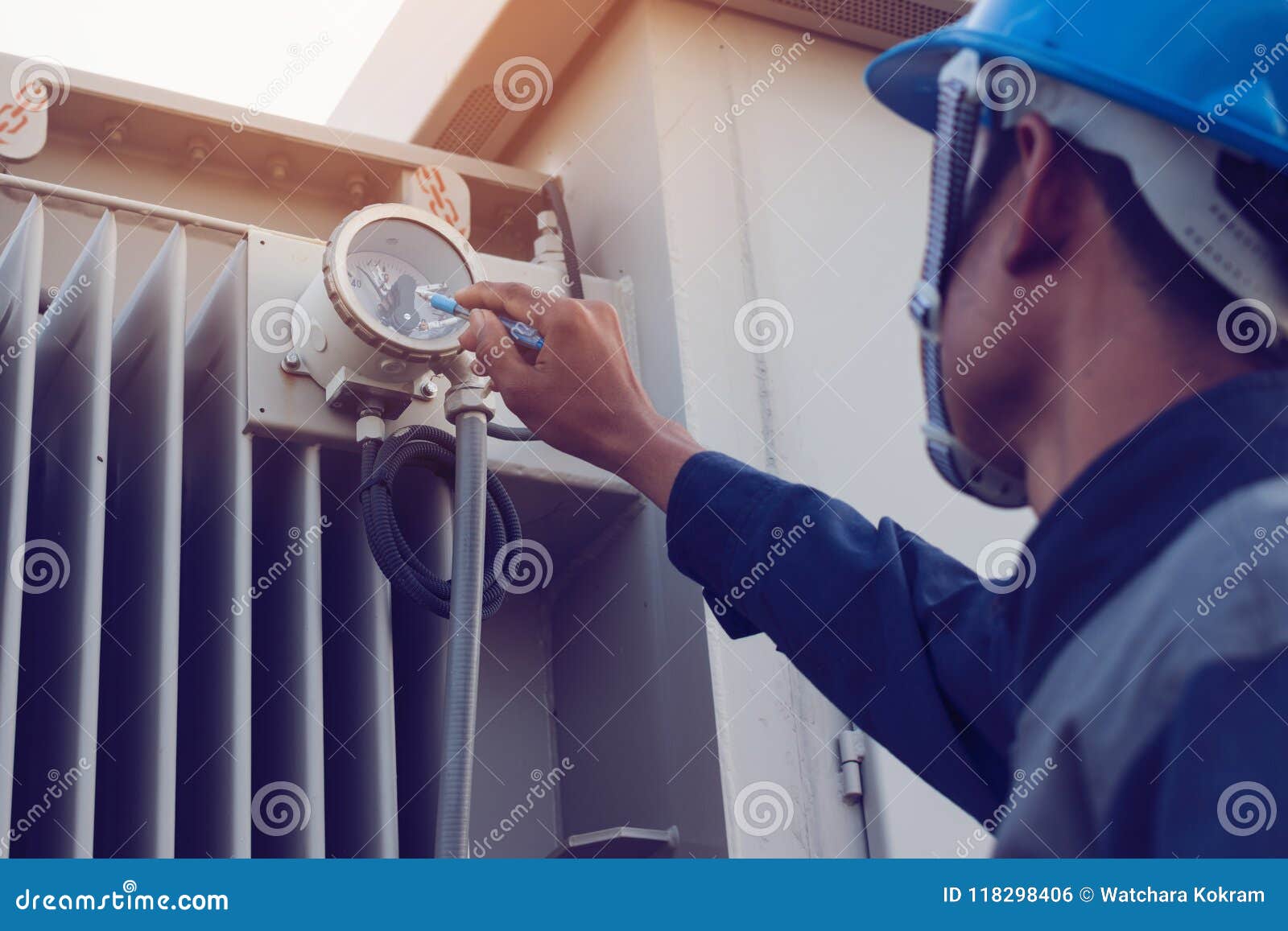 Engineer or Electrician Working on Checking and Maintenance Equipment ...