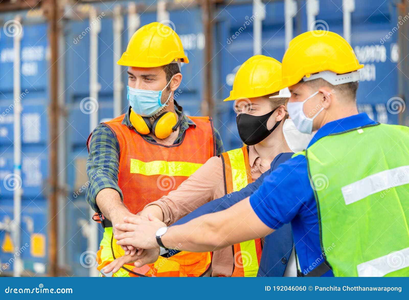 Engineer and Factory Worker Team Joining Hands at Containers Cargo ...
