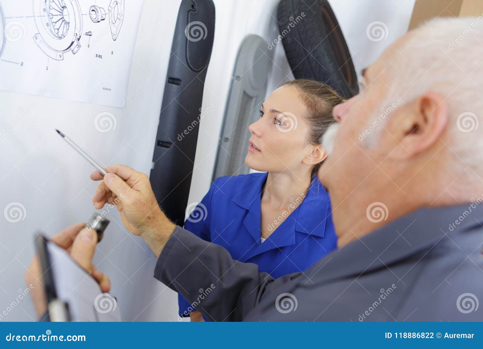 Engineer and Female Apprentice Working on Design Structure Stock Photo ...