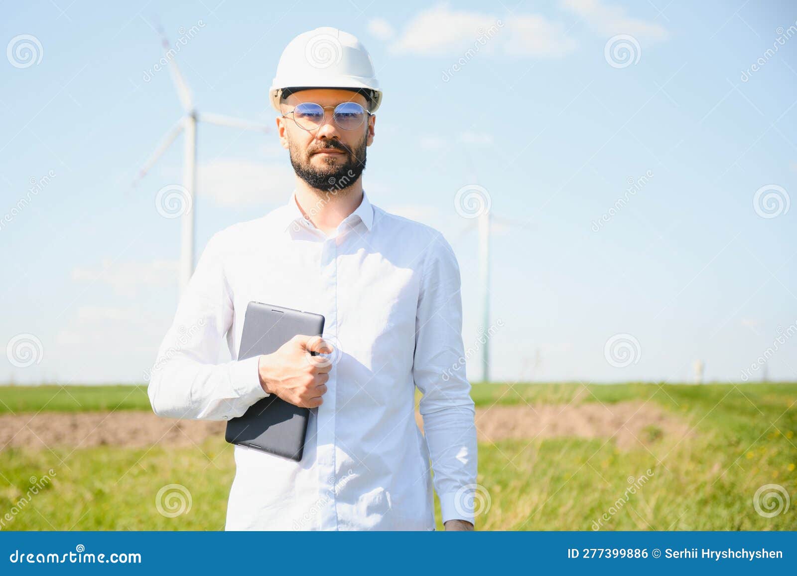 Engineer in Field Checking on Turbine Production Stock Photo - Image of ...