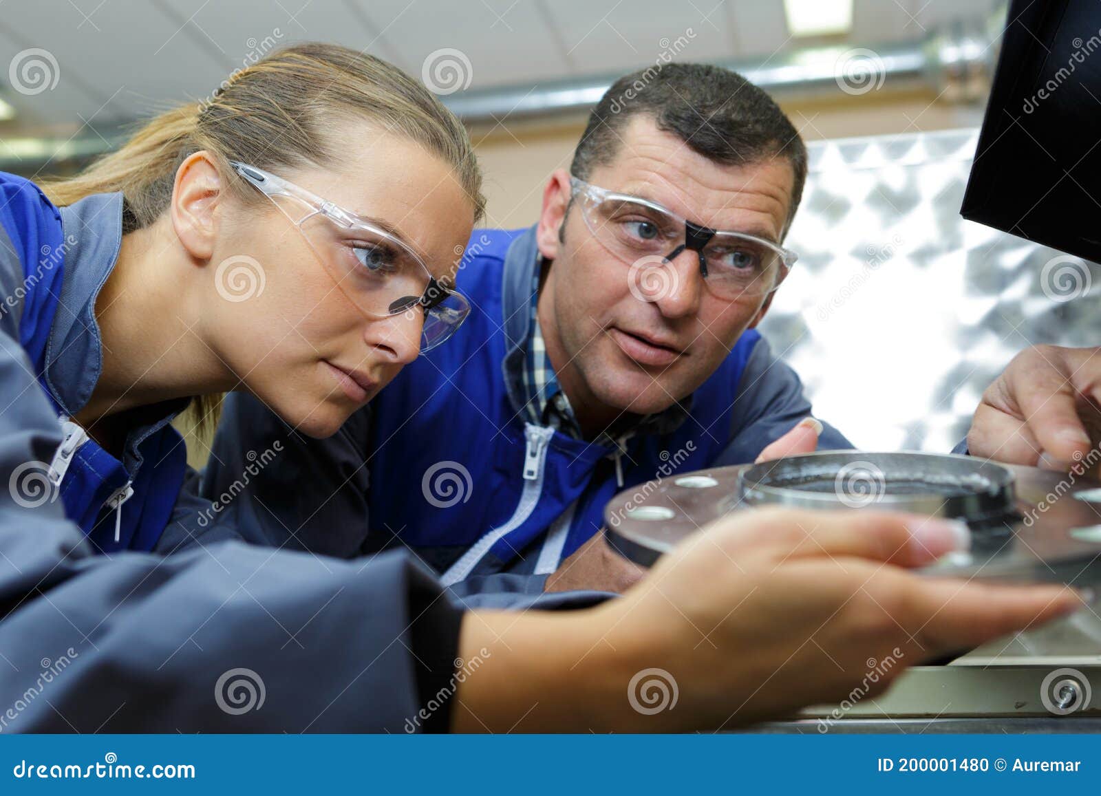 Engineer Fitting Circular Disc To Machine Stock Photo - Image of close ...
