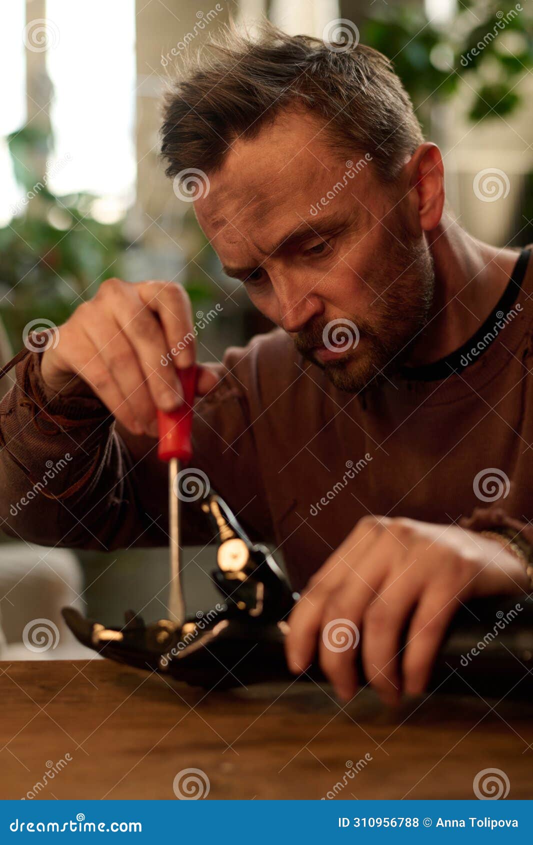 Engineer Fixing Bionic Arm stock photo. Image of future - 310956788