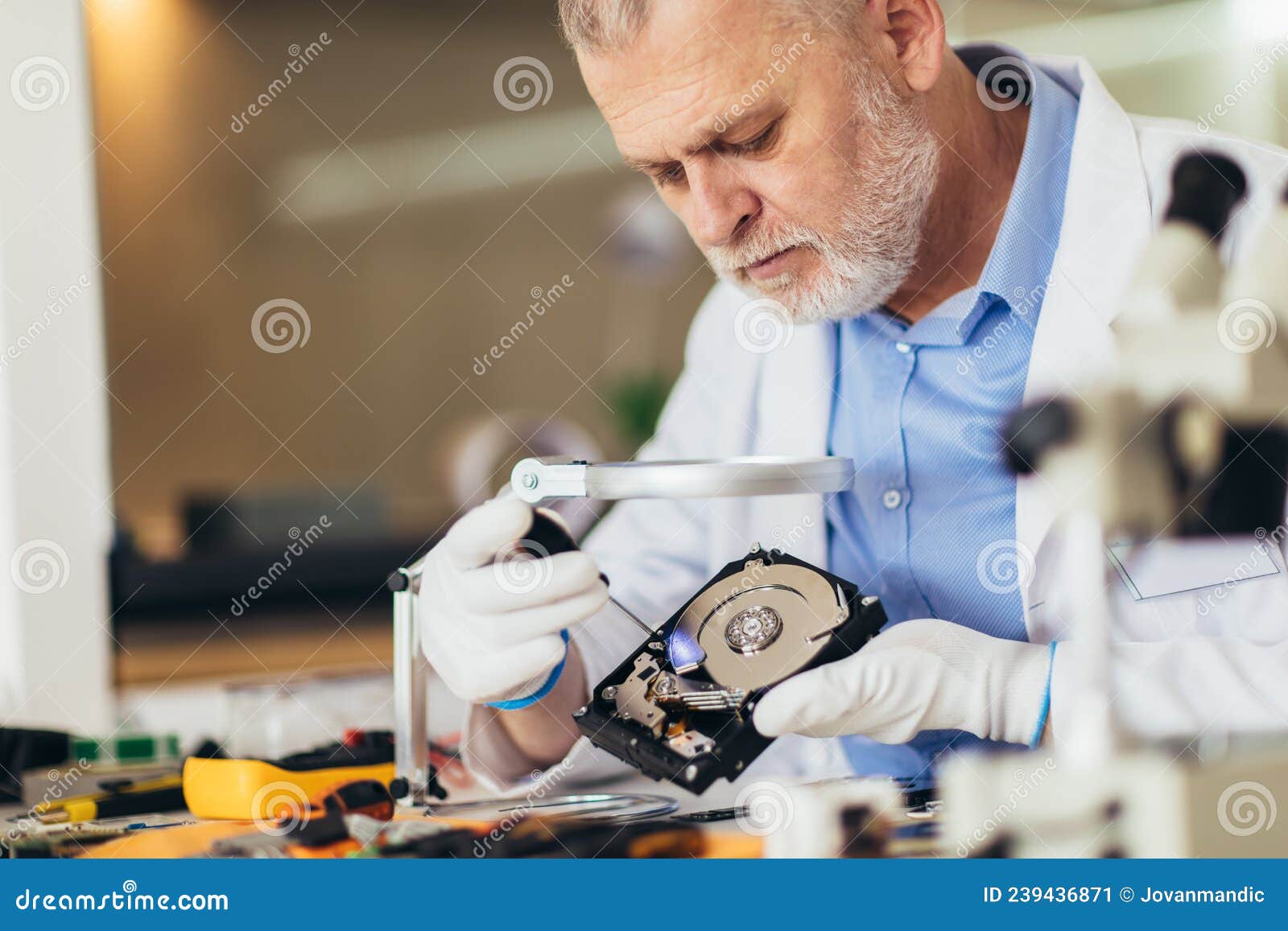 Engineer Fixing Broken Computer Hard Disc. Stock Image - Image of ...
