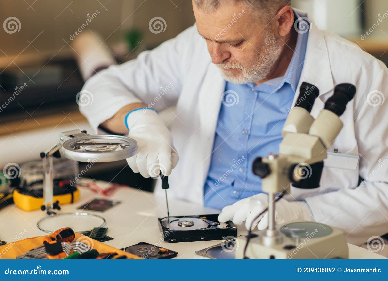 Engineer Fixing Broken Computer Hard Disc. Stock Photo - Image of ...
