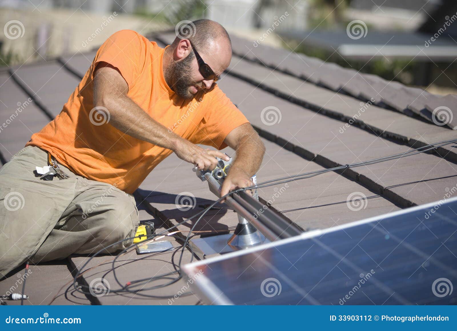 Engineer Fixing Solar Panel on Rooftop Stock Photo - Image of paneling ...