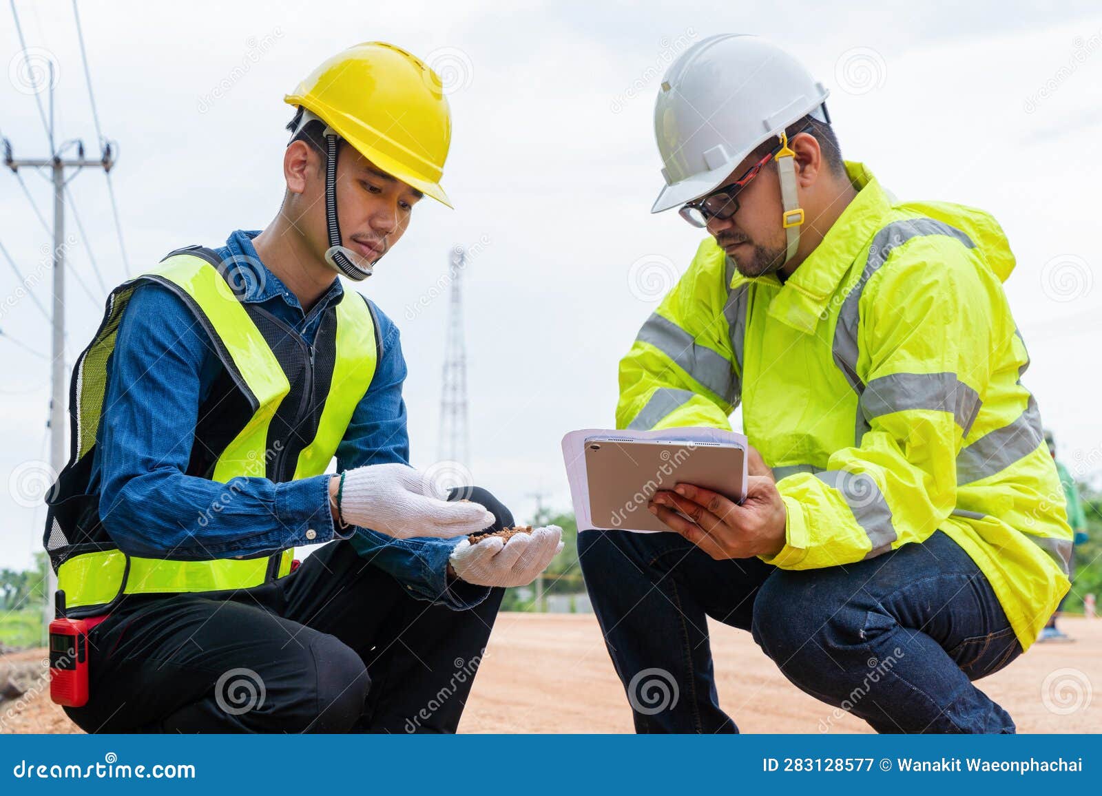 Engineer and Foreman Analyzing Road Construction Soil before Pouring ...