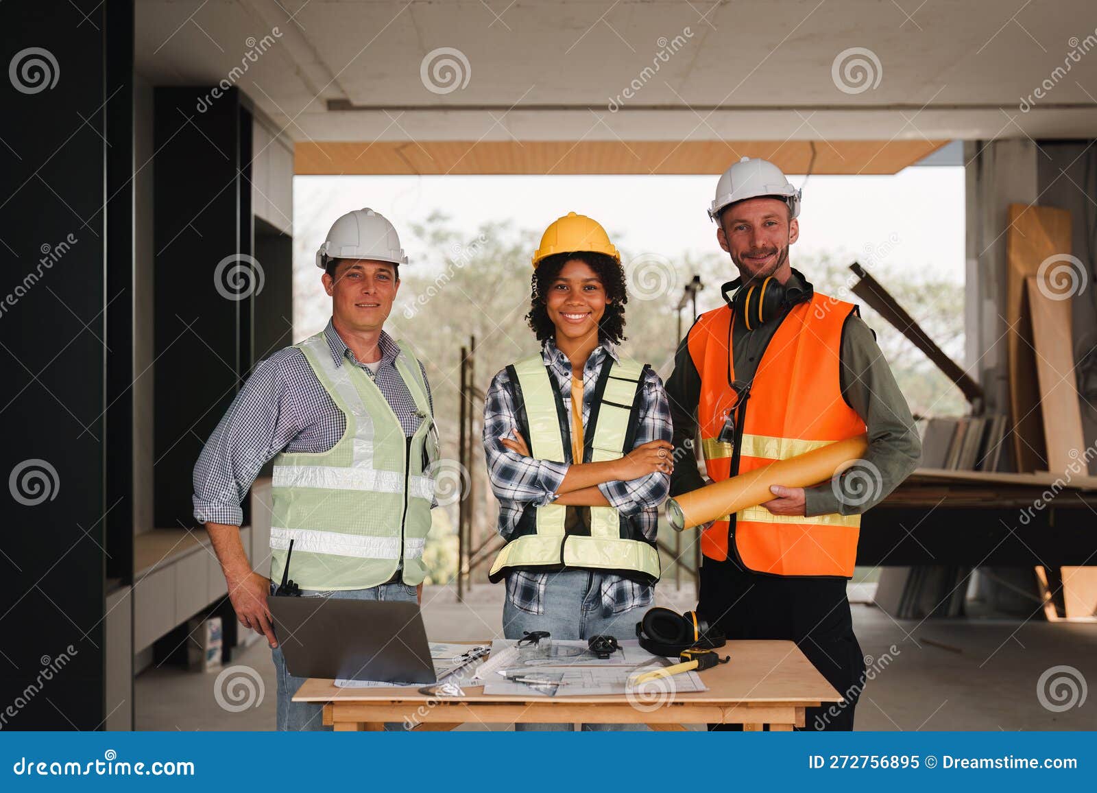 Engineer and Foreman Builder Team at Construction Site. American ...