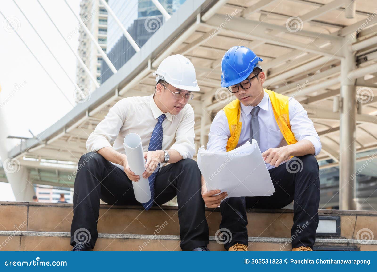 Engineer and Foreman Worker Team with Drawing Paper Planning Projects ...