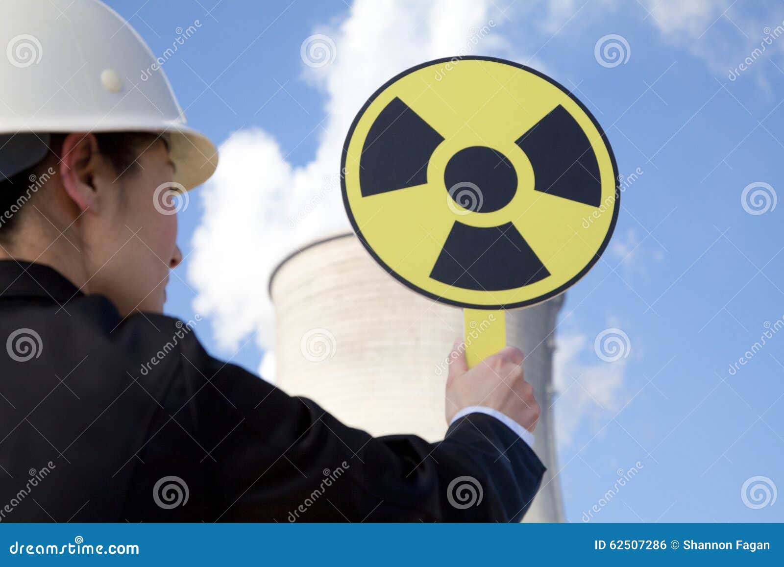 Engineer in Front of Cooling Towers with Sign Stock Photo - Image of ...