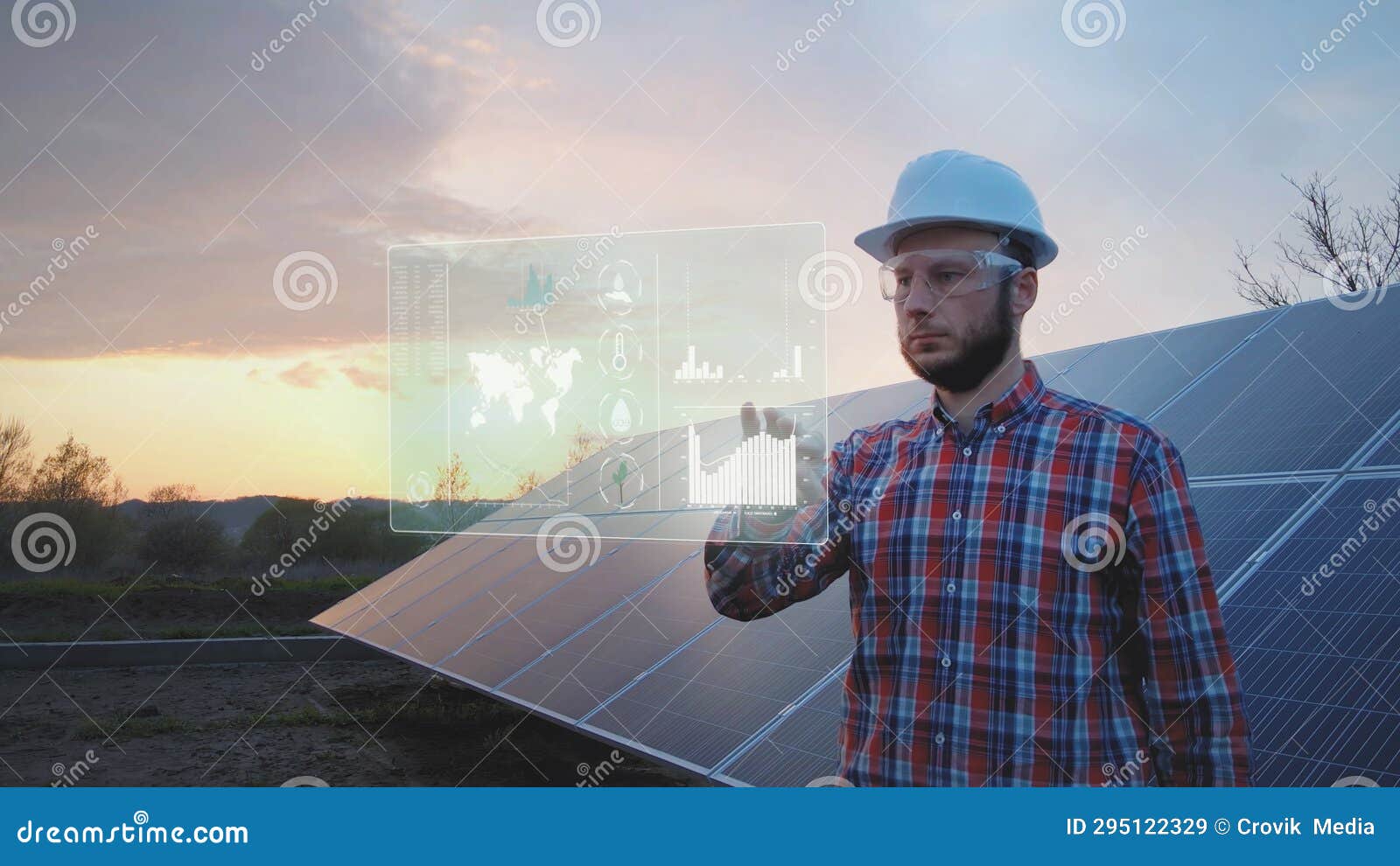 Engineer in Front of Solar Panel Works on Futuristic Table HUD Display ...