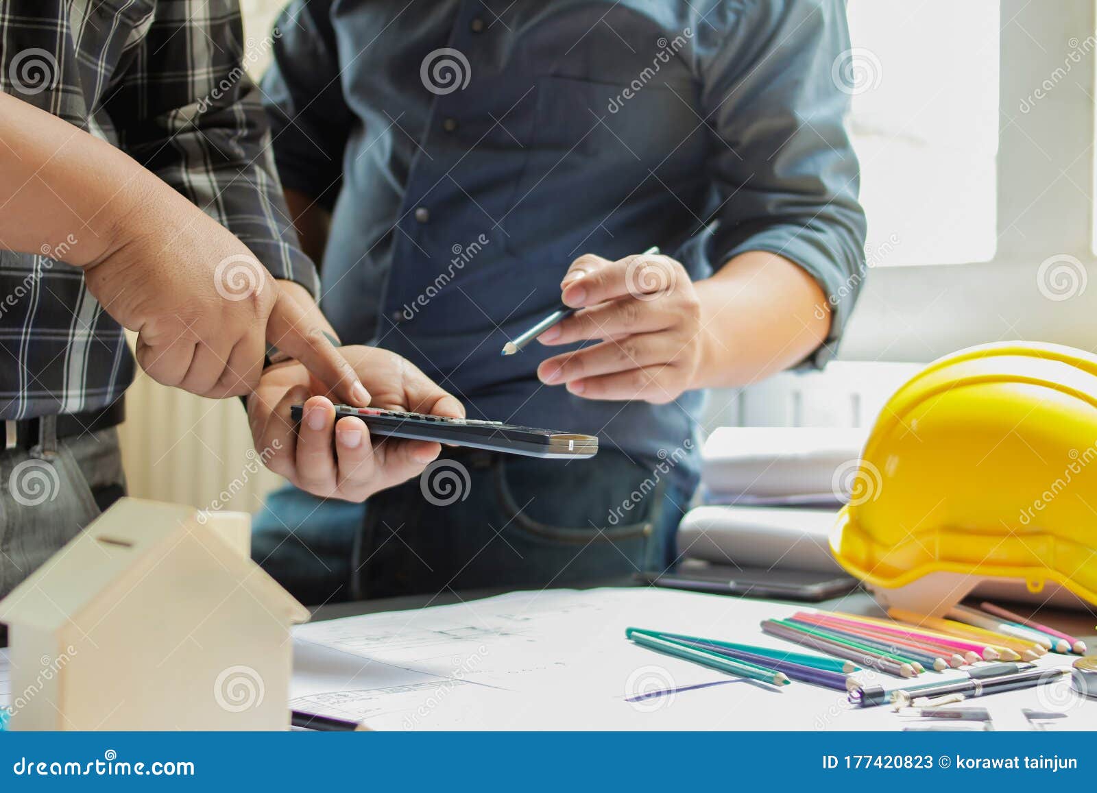 The Engineer is Giving Advice and Consulting with the Designer To Find ...